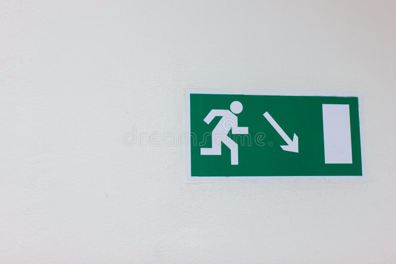 Emergency Green Fire Exit Sign, on the Ceiling at Night. Stock Image ...