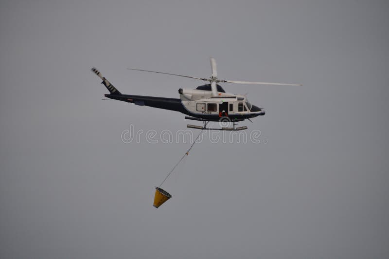 Helicopter Saving People in Flight Stock Photo - Image of aero, flying ...