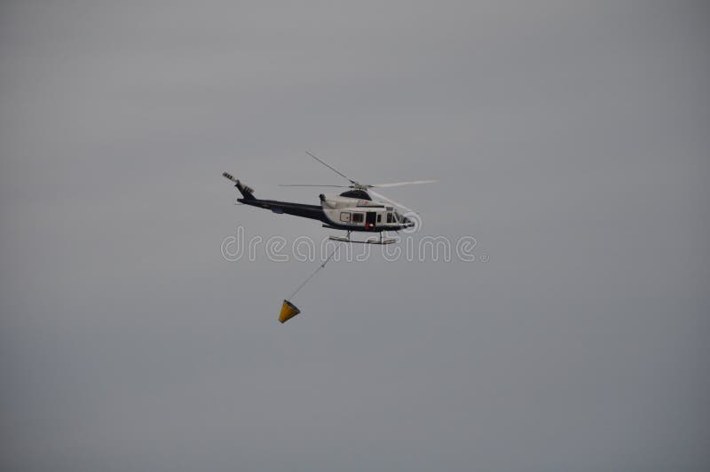Helicopter Saving People in Flight Stock Photo - Image of saving ...
