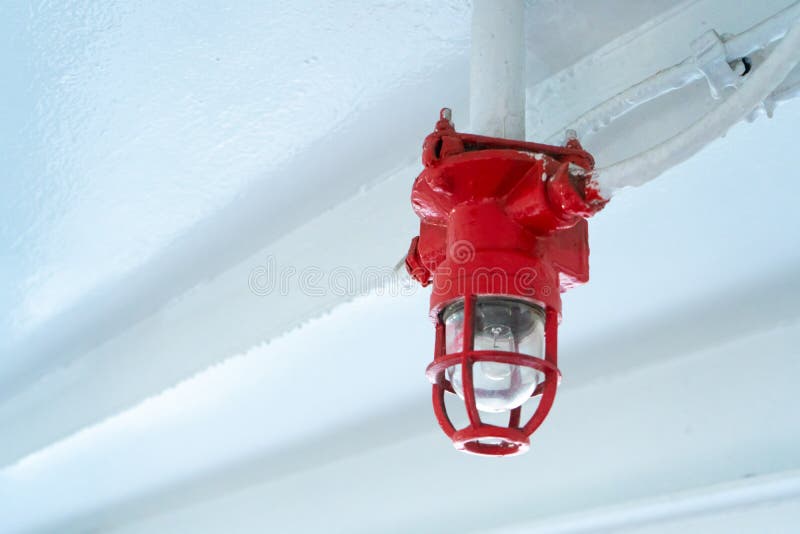 Emergency Lighting System. Lamps Protected by a Grill Stock Photo ...