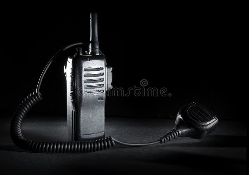 Emergency Radio and Mike with Lightning Storm Behind Stock Photo ...
