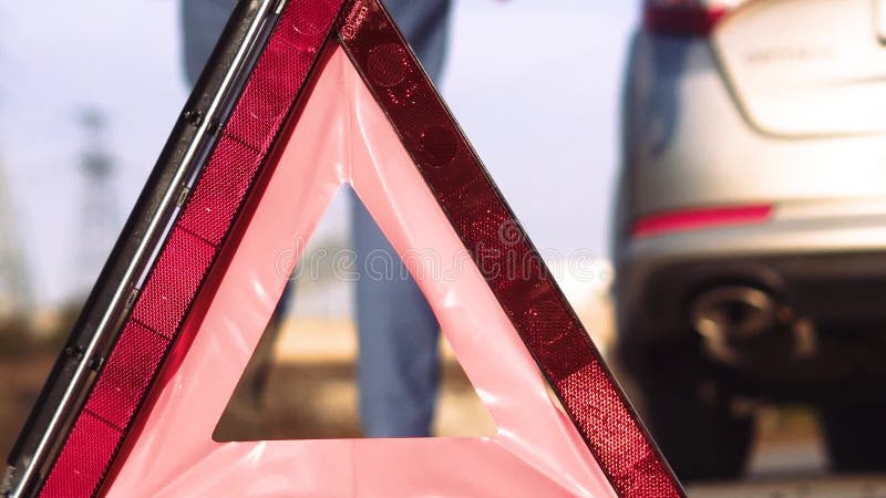 Emergency Red Sign on Road, Male Driver Checking Car Crash Victim Pulse ...