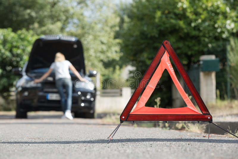 Emergency Stop Sign and Broken Car on Road Stock Photo - Image of ...
