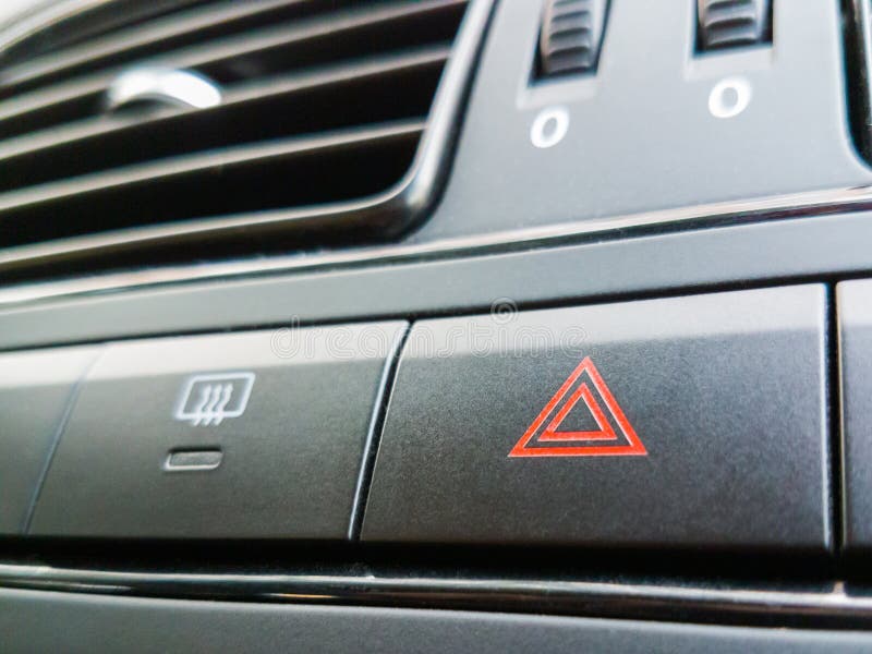 Emergency Warning Button with Triangle Pictogram on Panel in a Car ...