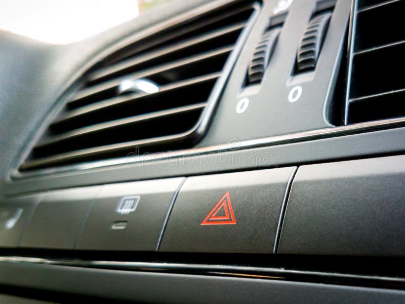Emergency Warning Button with Triangle Pictogram on Panel in a Car ...