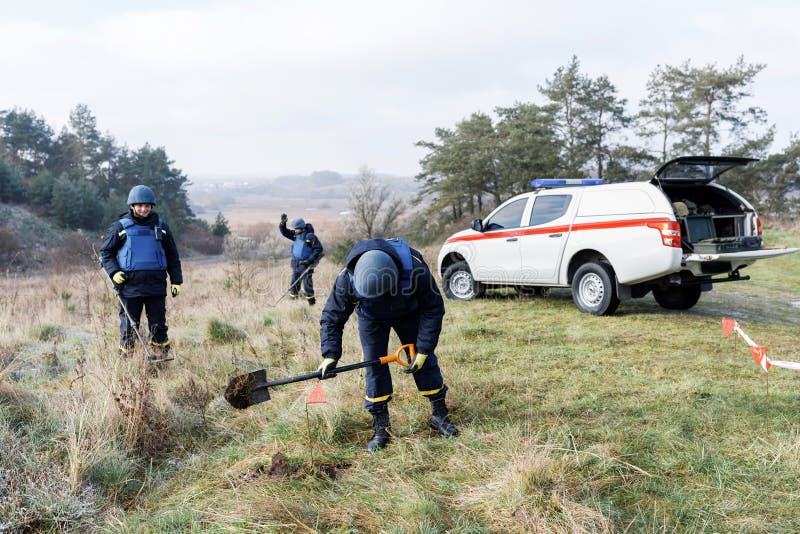 Men Work in Emergencies. Emergency Workers Work Outdoors. a Man in ...