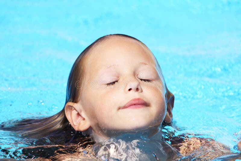 Emerging from the water stock image. Image of bathing - 10584059