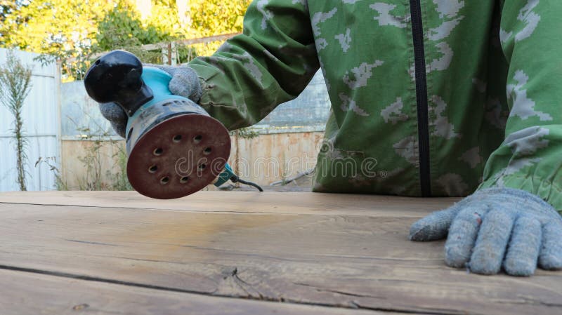 Emery Disc on a Sanding Machine in a Carpenter S Hand Stock Photo ...