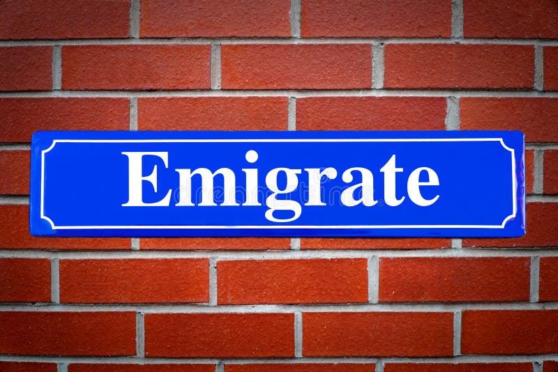 Emigrate Street Sign on Brick Wall Stock Photo - Image of symbol ...
