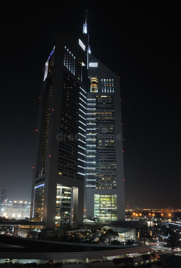 Emirates Towers in Dubai stock image. Image of night, architecture ...