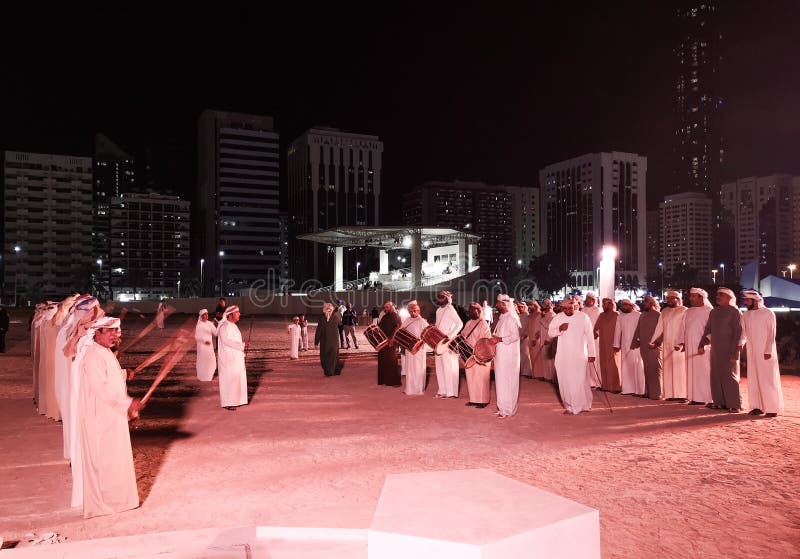 Emirati Men Perform a Tradional Middle Eastern Dance the Yowla Stock ...