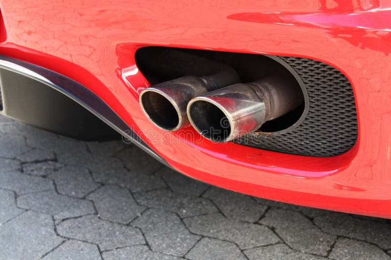 Emission pipe of a red car stock photo. Image of luxury - 28303352