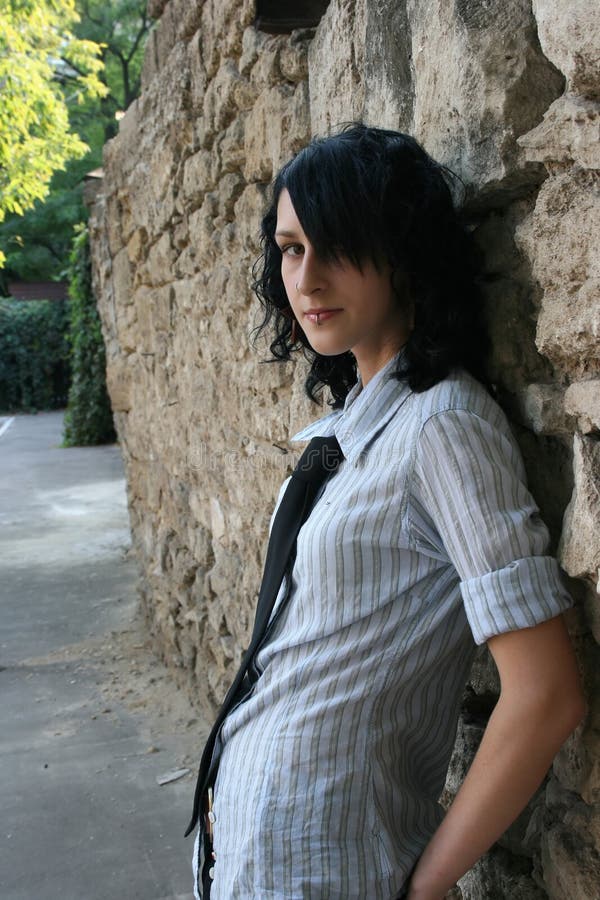 Emo kid near the wall stock image. Image of tree, people - 7184531