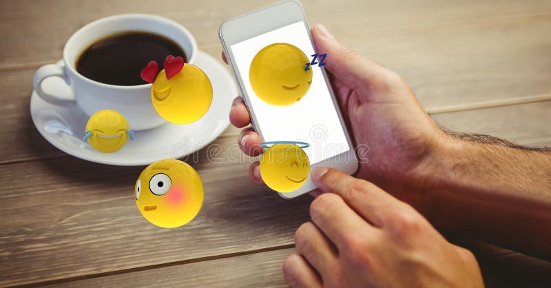 Emojis Coming Out from Smart Phone Held by Man with Coffee Cup on Table ...