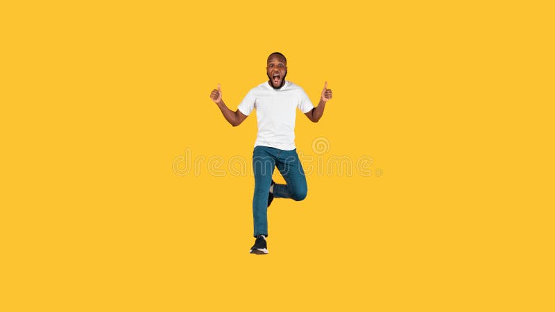 104 Happy Excited Young Black Man Jumping Over Yellow Stock Photos ... 104 Happy Excited Young Black Man Jumping Over Yellow Stock Photos ...