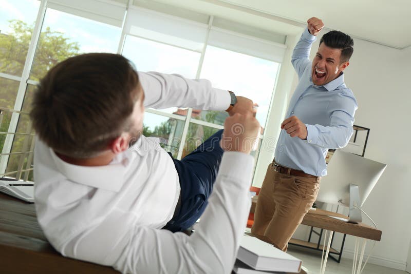 Emotional Colleagues Fighting in Office. Workplace Conflict Stock Image ...