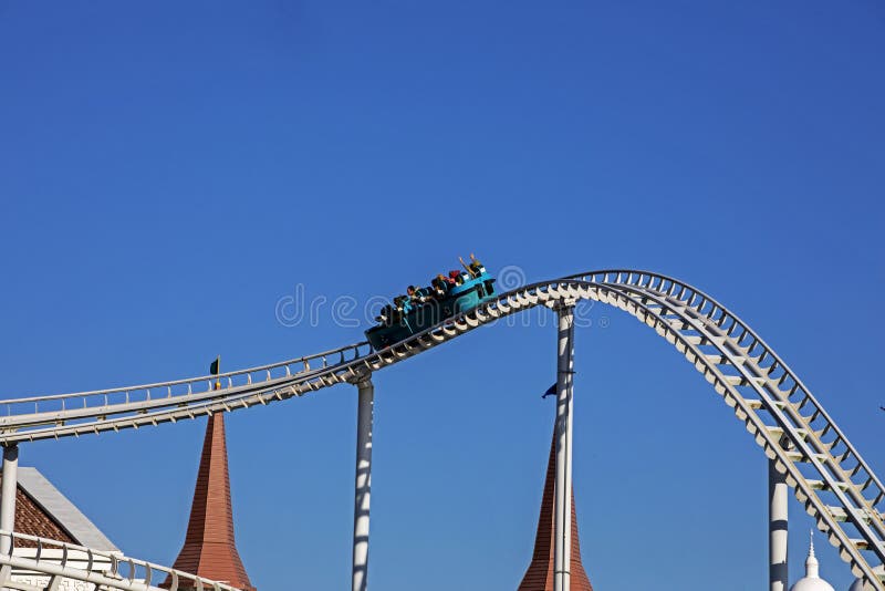 Emotional Extreme Roller Coaster at Speed Against the Background of the ...