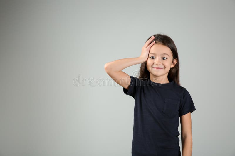 Emotional Girl after Making Mistake on Color Background Stock Photo ...