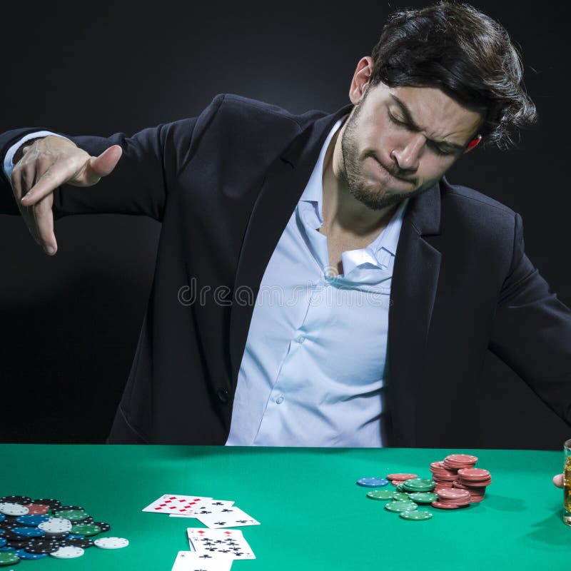 Emotional Handsome Caucasian Brunet Pocker Player at Pocker Table with ...