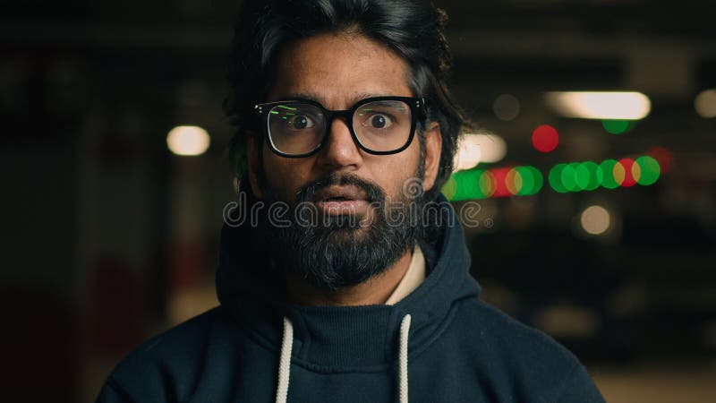 Emotional Indian Shocked Bearded Guy In Glasses Astonished Looking At