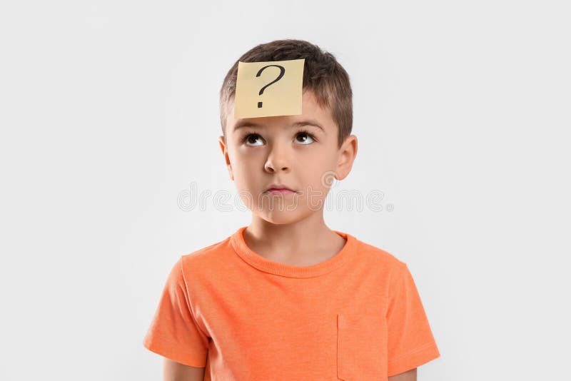 Emotional Little Boy with Question Mark on White Background Stock Photo ...