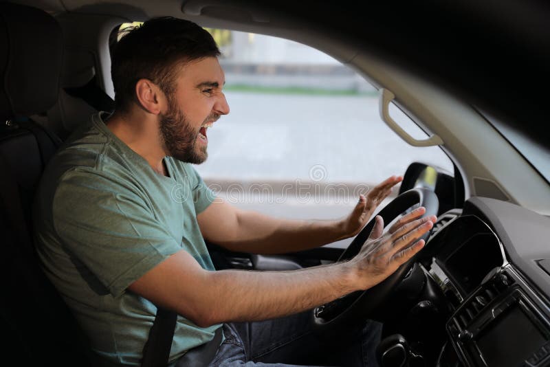 Emotional Man in Car. Aggressive Driving Stock Photo - Image of ...