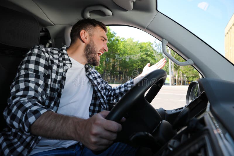 Emotional Man in Car. Aggressive Driving Behavior Stock Photo - Image ...