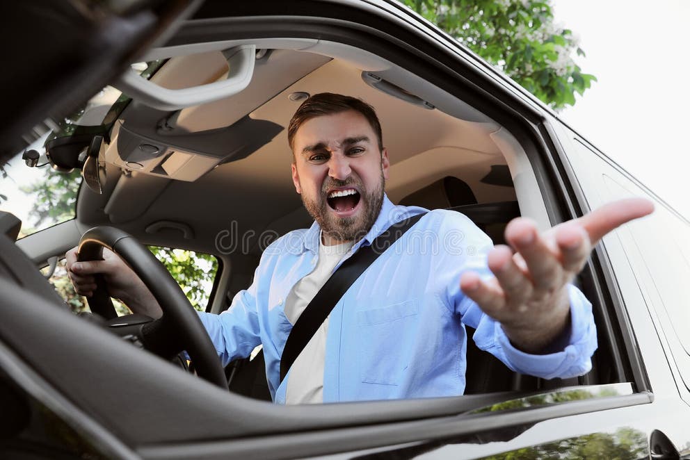 Emotional Man in Car. Aggressive Driving Behavior Stock Photo - Image ...