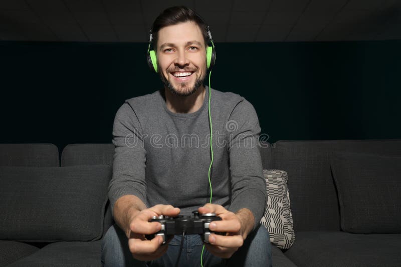 Emotional Man Playing Video Game at Home Stock Photo - Image of ...