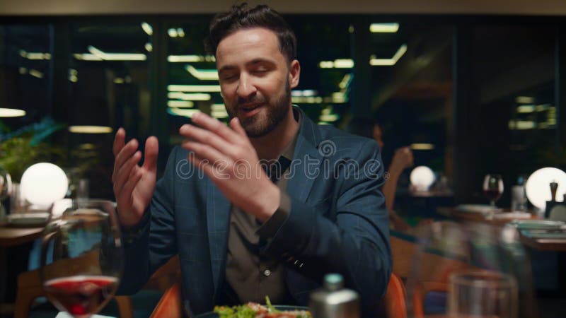 Emotional Man Talking Date on Dinner. Guy Gesturing Hands on Restaurant ...
