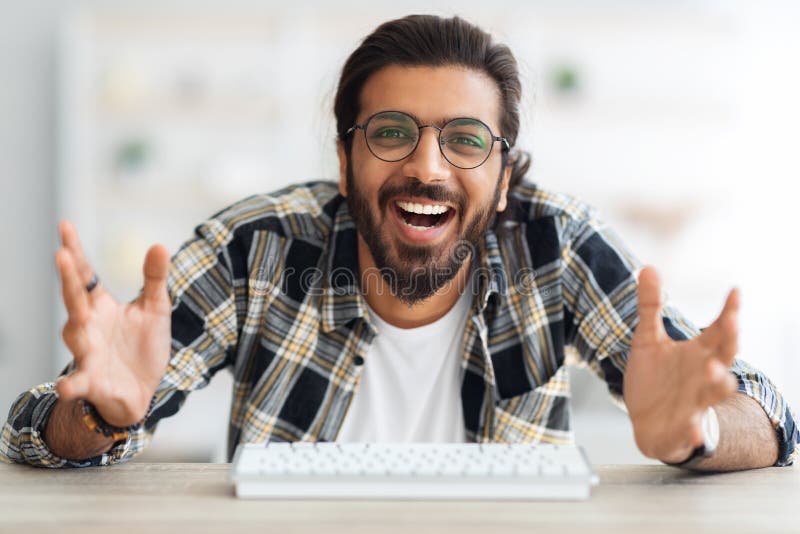 Emotional Middle-eastern Guy Having Video Conference with Someone Stock ...