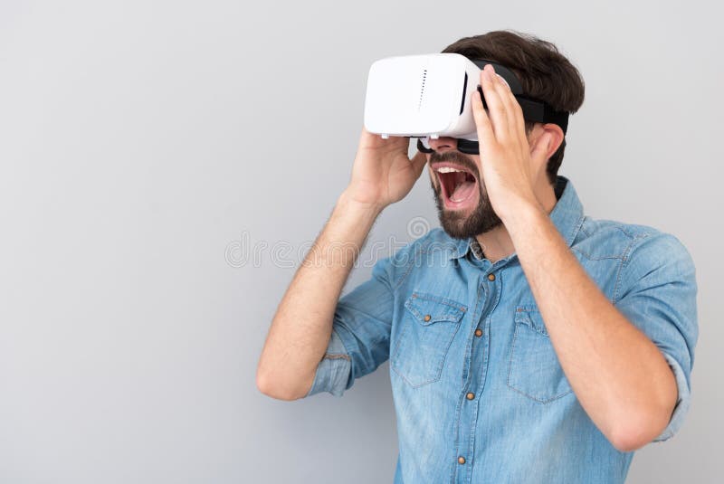 Emotional Smiling Man Using Virtual Reality Device Stock Image - Image ...