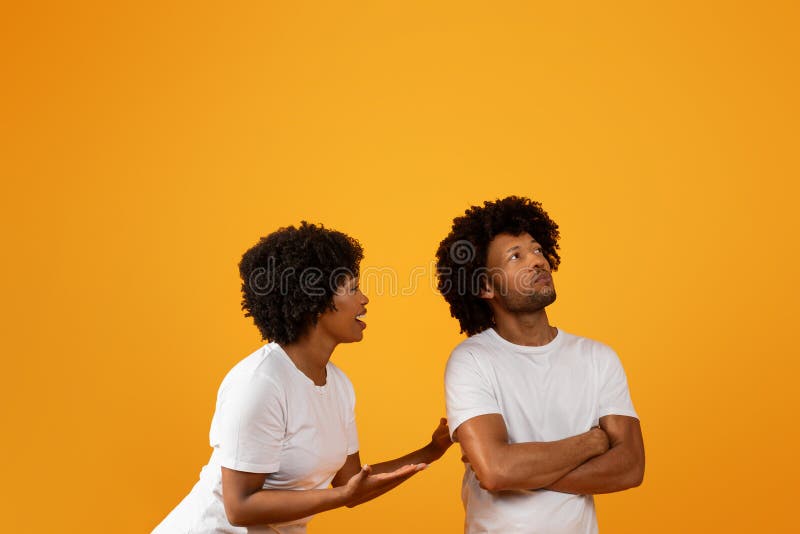 Emotional Young African American Woman Talking To Her Offended Husband