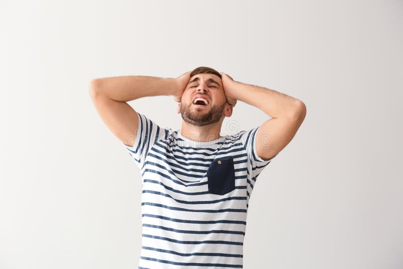 Emotional Young Man after Making Mistake on White Background Stock ...