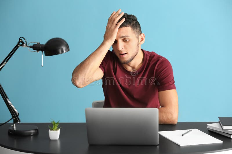Emotional Young Man after Making Mistake during Work with Laptop Stock ...