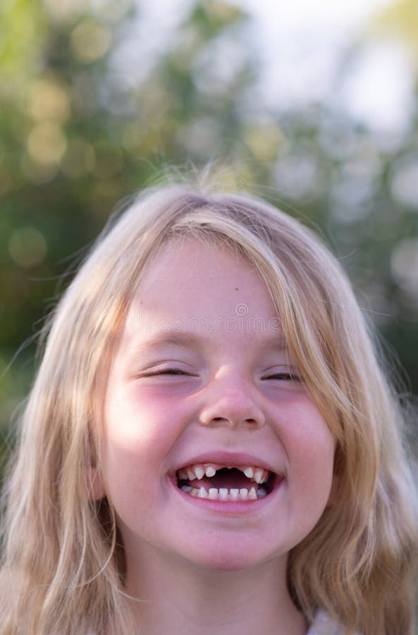 Emotions. a Little Girl Expresses Different Emotions on Her Face. Stock ...