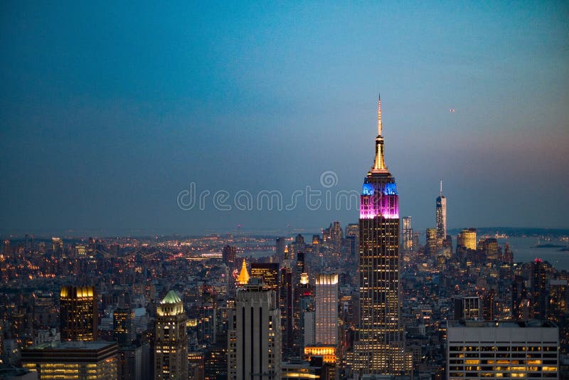 Empire State Building Lit at Sunset Editorial Photo - Image of sunset ...