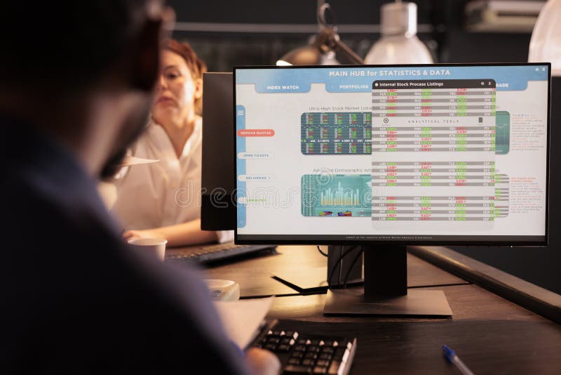 Employee Analyzing Trading Stock Market Using Analytics Software Stock ...