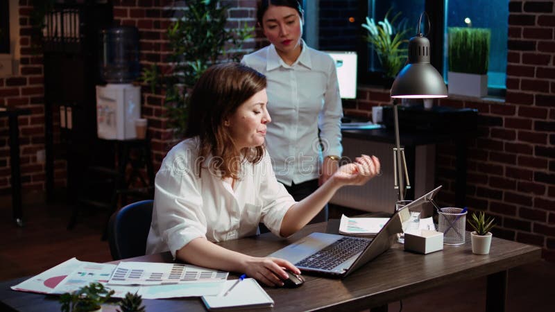 Employee Asking for Help from Coworker after Being Stuck on Project ...