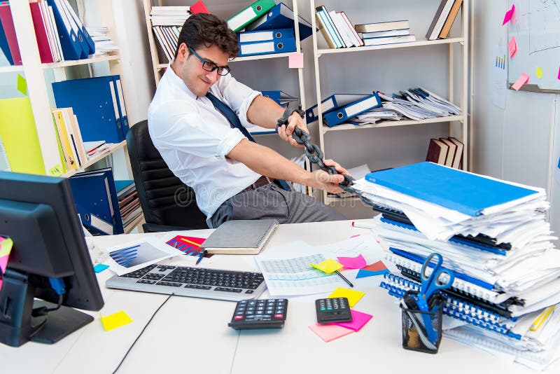 The Employee Attached and Chained To His Desk with Chain Stock Image ...
