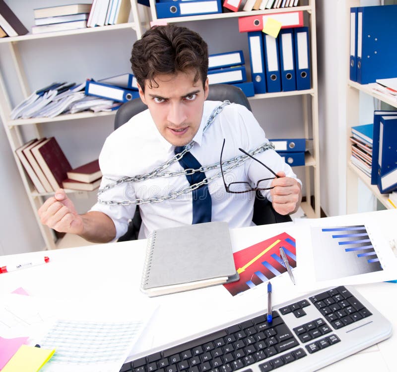 Employee Attached and Chained To His Desk with Chain Stock Photo ...