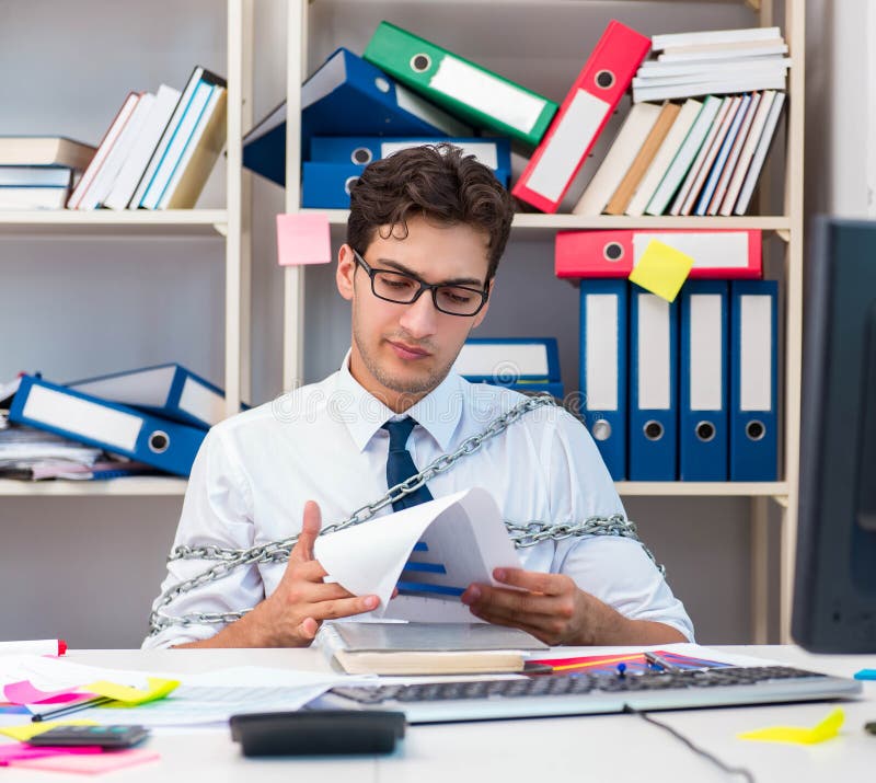 Employee Attached and Chained To His Desk with Chain Stock Photo ...