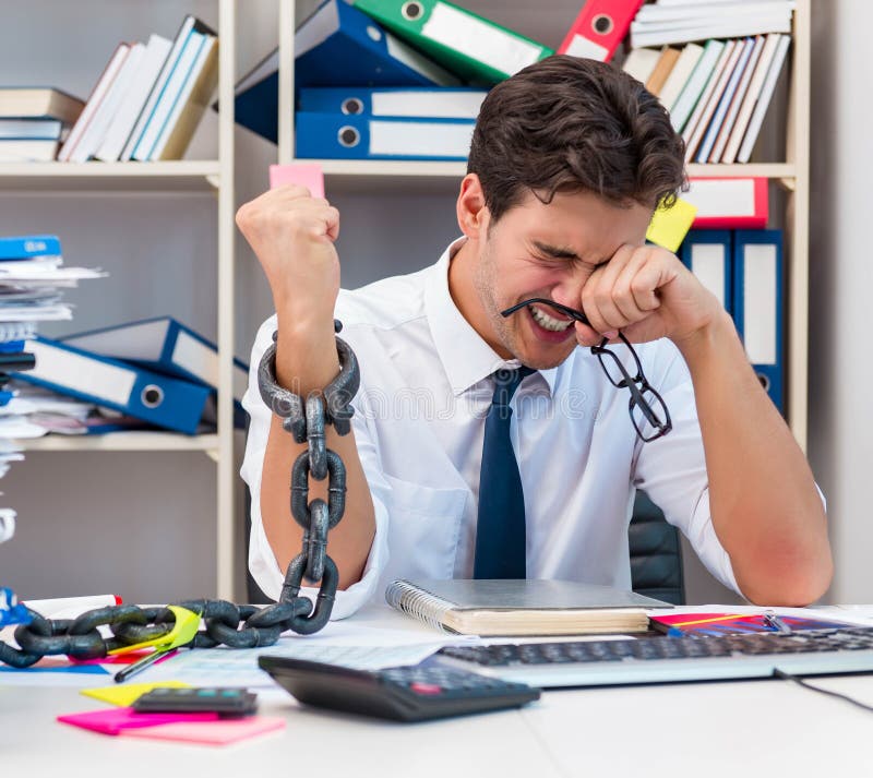 Employee Attached and Chained To His Desk with Chain Stock Photo ...