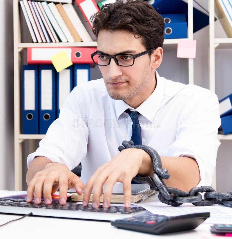 Employee Attached and Chained To His Desk with Chain Stock Photo ...