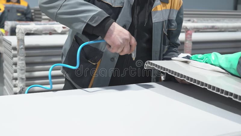 Employee Blows Out Dust from Polymer Windowsill Profile Stock Footage ...