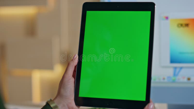 Employee Browsing Greenscreen Tablet Application at Studio Workplace ...