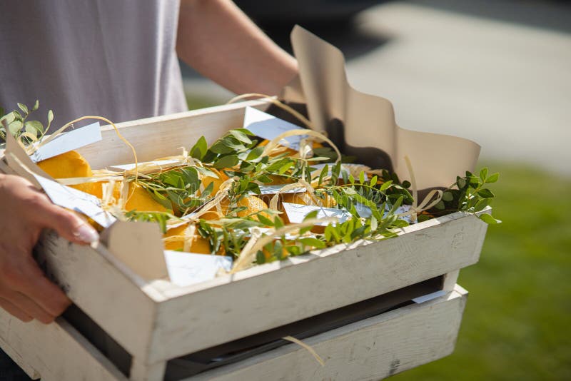 Employee Carries a Box with Wedding Decorations. Close View Stock Photo ...