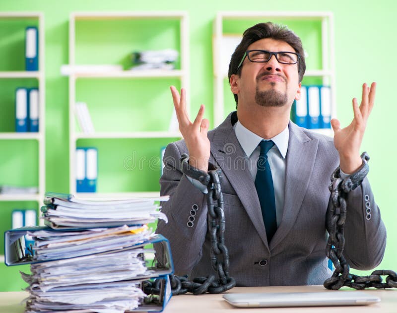 Employee Chained To His Desk Due To Workload Stock Photo - Image of ...