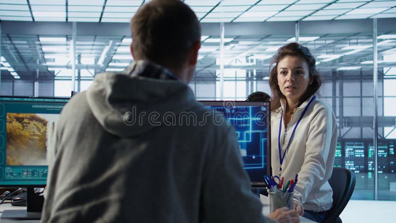 It Employee and Coworker Talking while Building AI Diffusion Model App ...