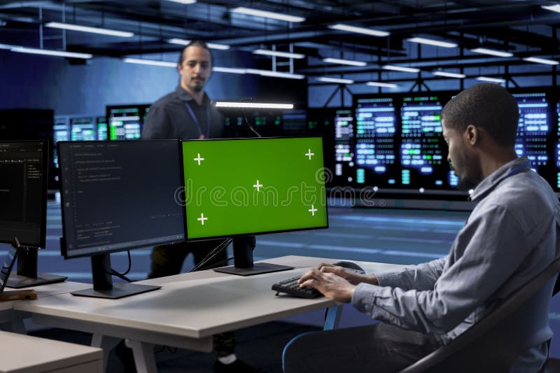 Employee in Data Center Workplace Doing Disk Checks Using Chroma Key ...